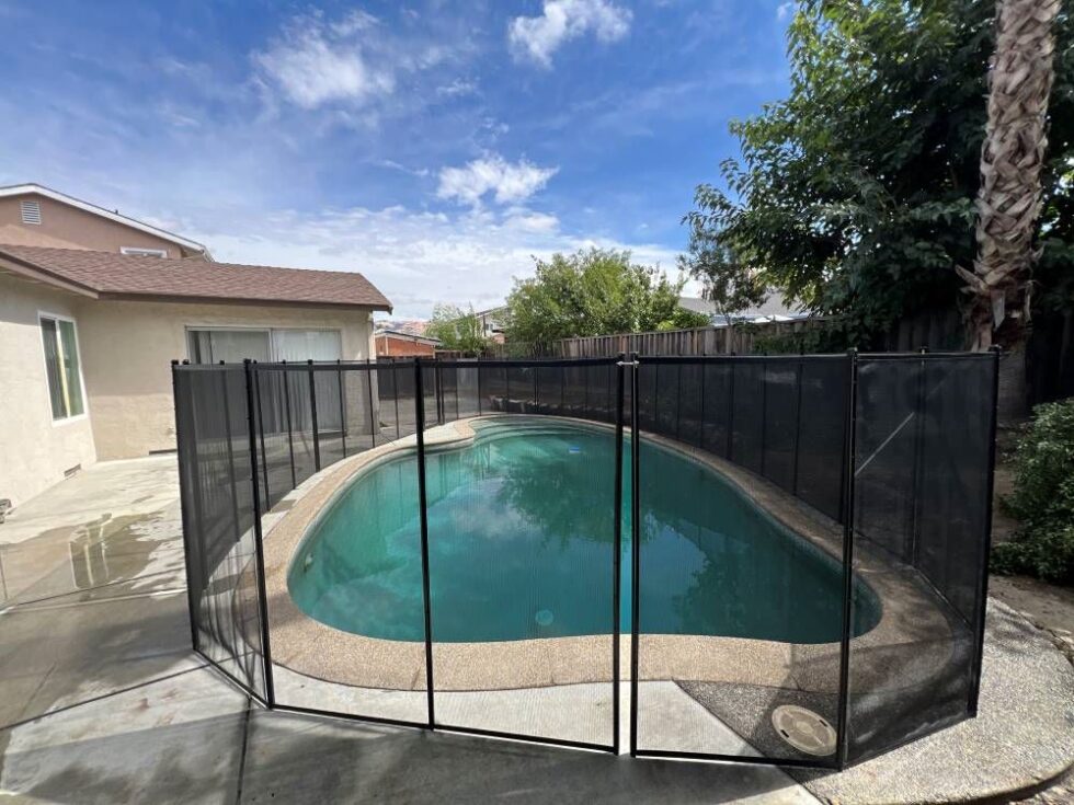 Our Pool Fence Guarding Your Pool - Baby Barrier® Pool Fence of San Jose